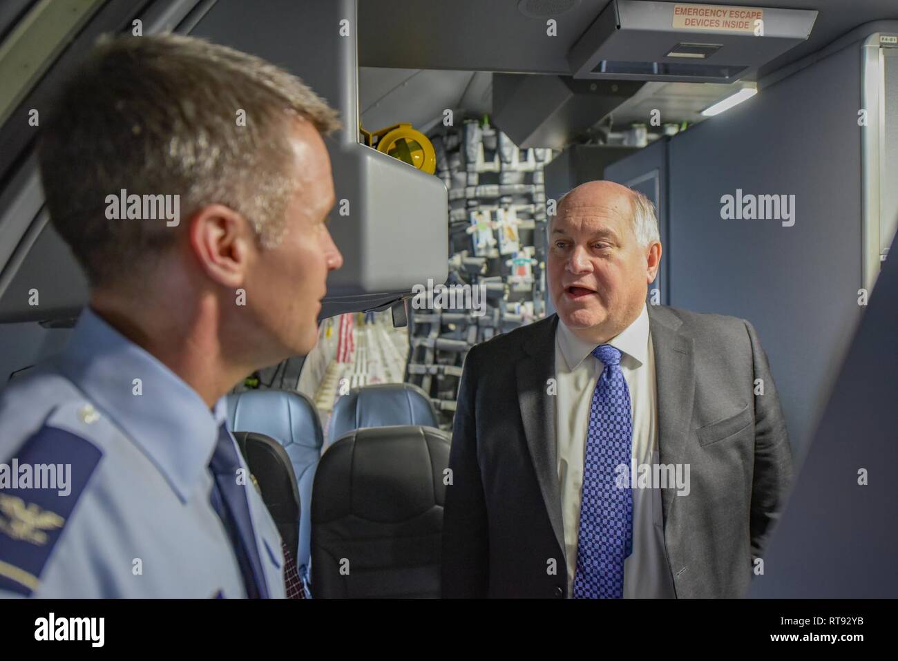 U.S. Representative Ron Estes talks with Col. Daniel Tulley, Air Force ...