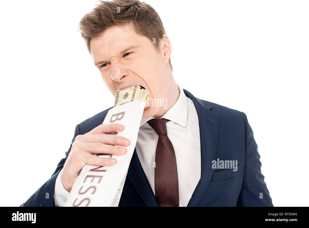 businessman biting dollars wrapped in business newspaper, isolated on ...