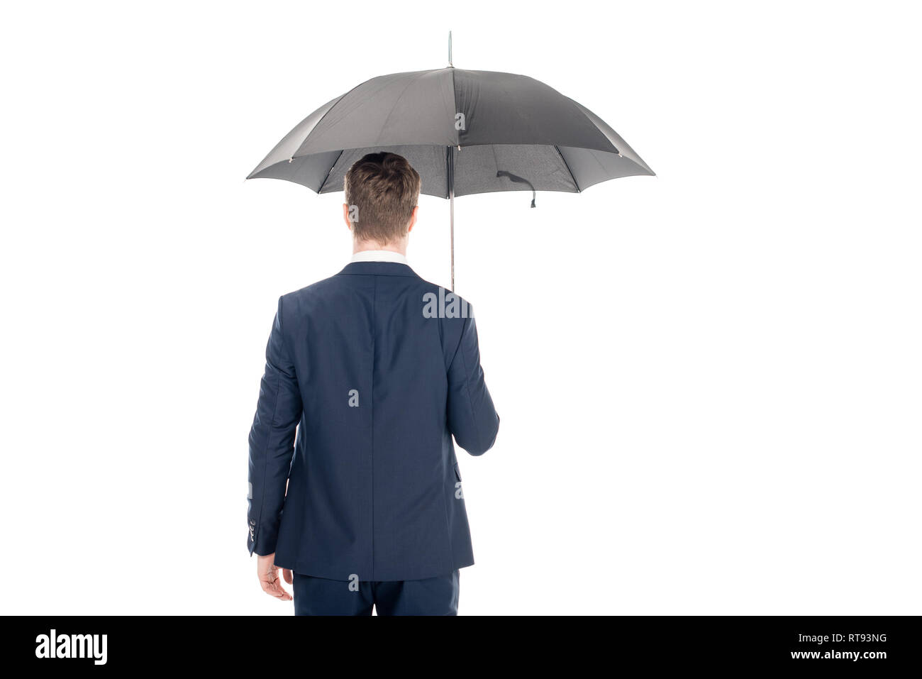 back view of stylish businessman posing with umbrella isolated on white ...