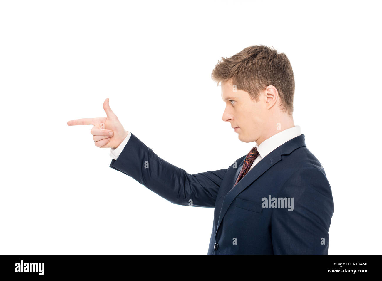 side view of stylish young businessman pointing isolated on white Stock ...