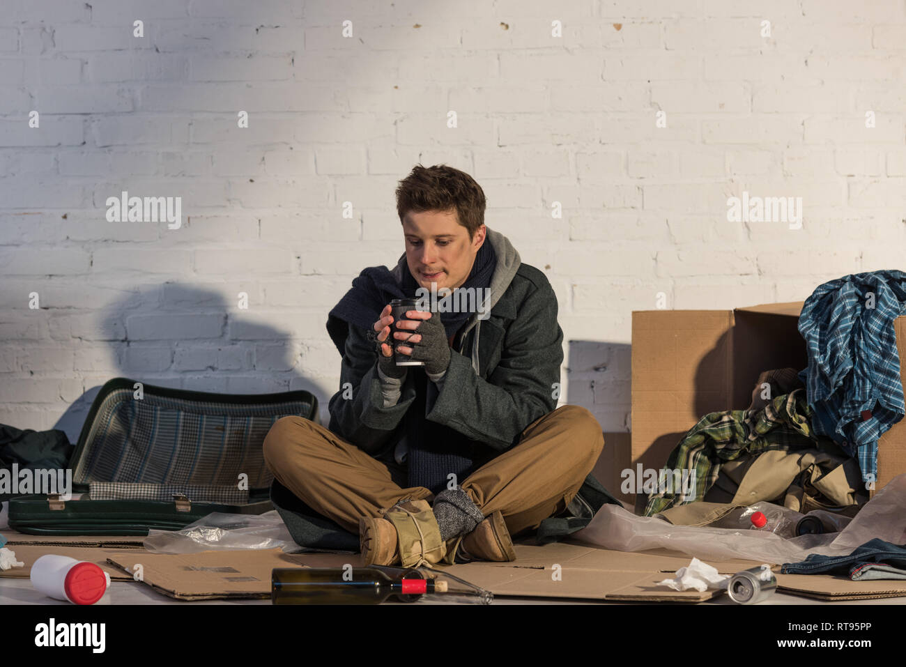 Homeless man drinking hi-res stock photography and images - Alamy