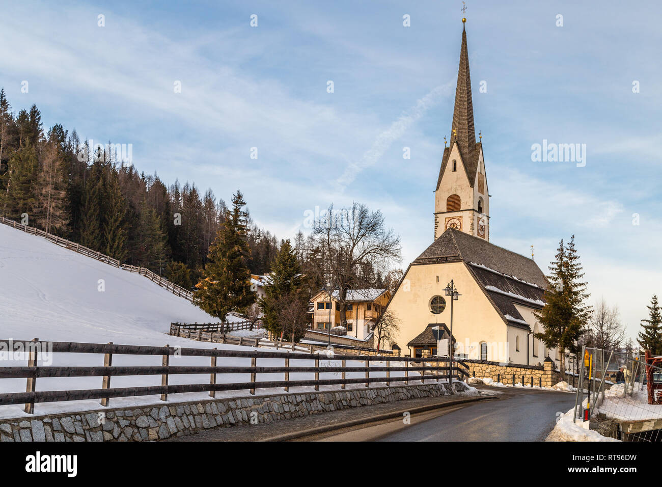Catholic church in Alpine snowy panorama Stock Photo - Alamy