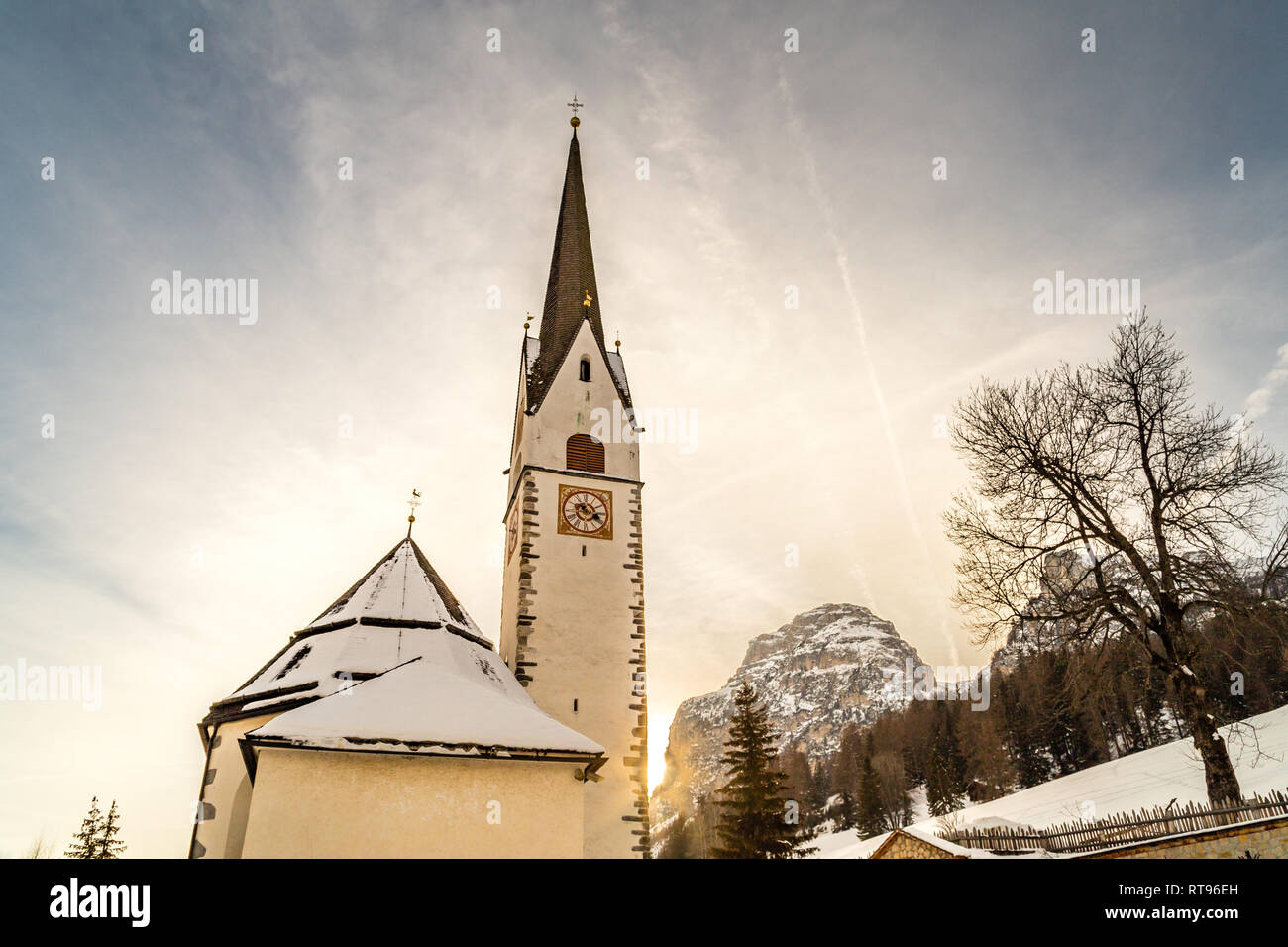 Catholic church in Alpine snowy panorama Stock Photo - Alamy
