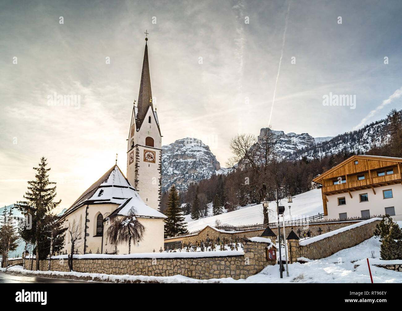 Catholic church in Alpine snowy panorama Stock Photo - Alamy