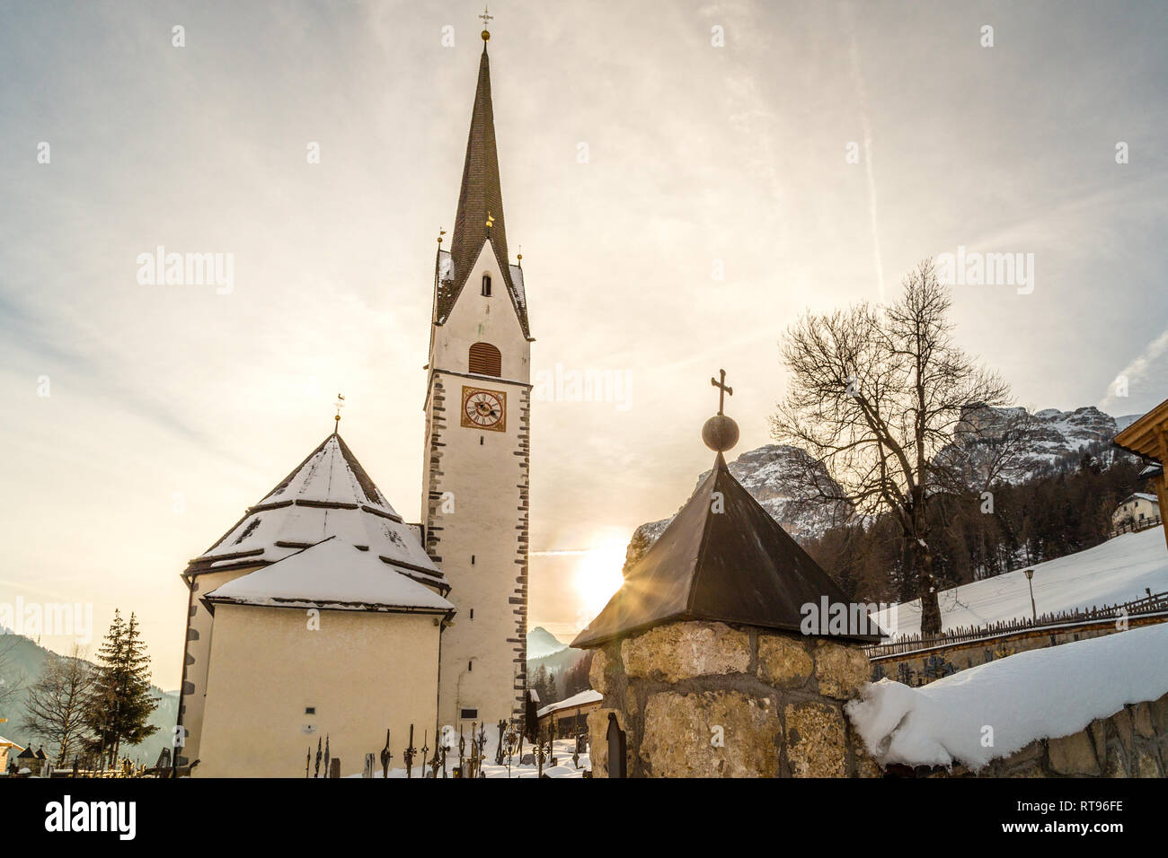 Catholic church in Alpine snowy panorama Stock Photo - Alamy