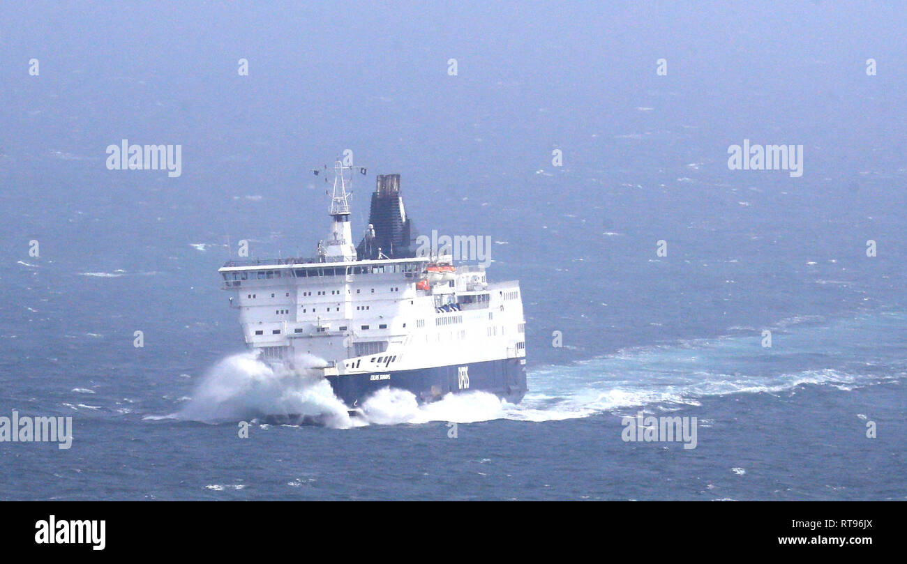 The DFDS Calais Seaways crashes through waves as she arrives in Dover ...