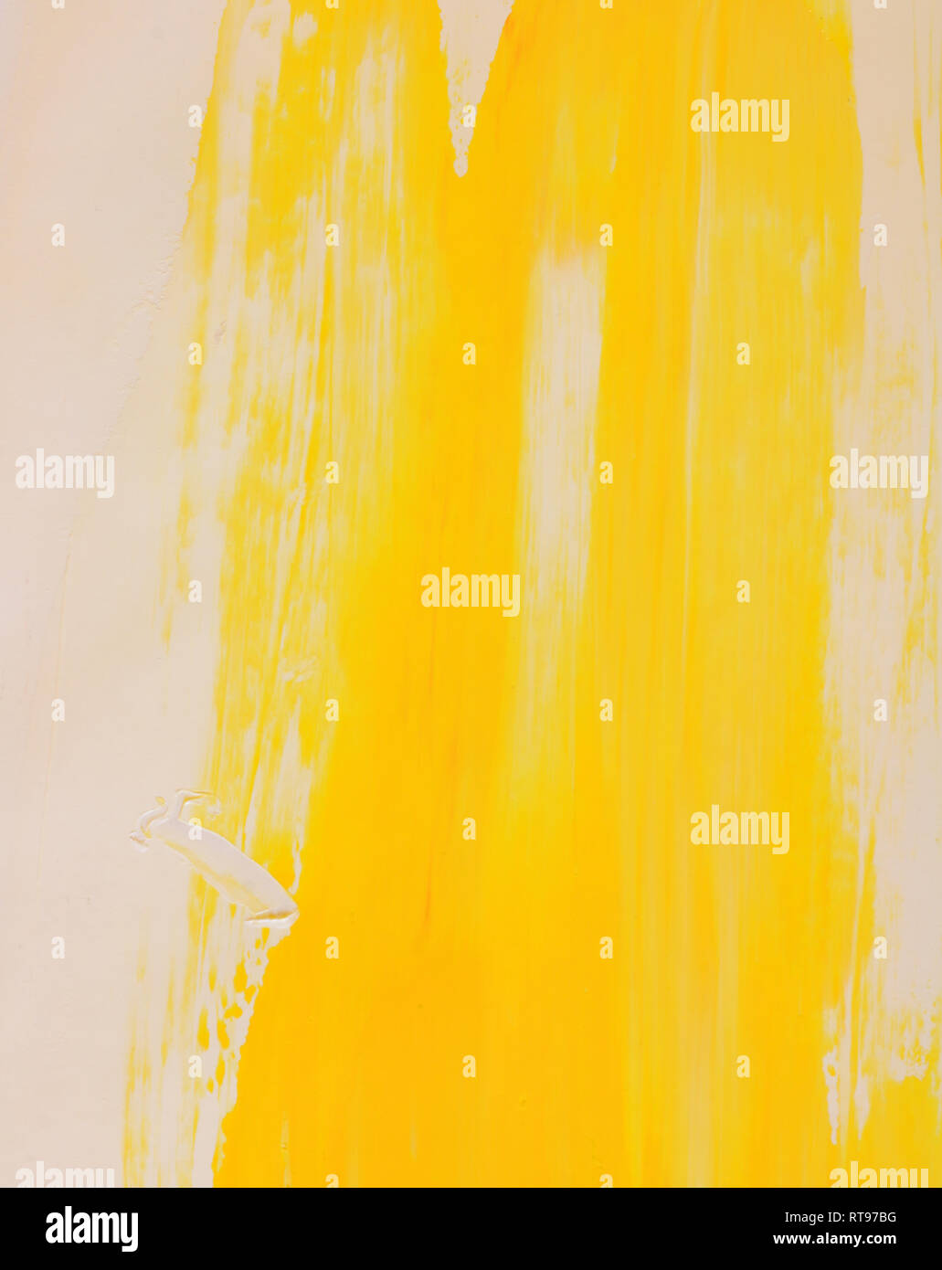 Yellow paint on wall Stock Photo - Alamy