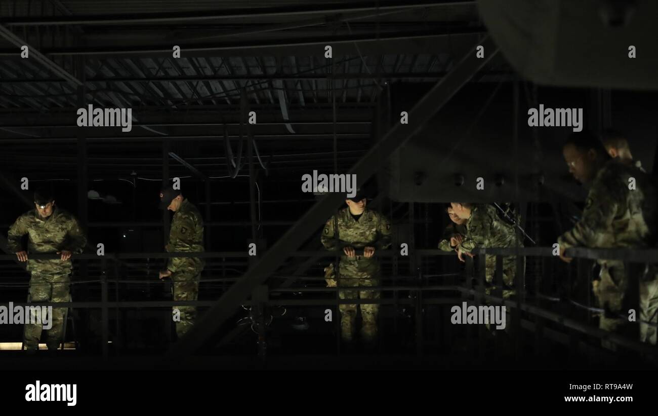 Instructors at The Sabalauski Air Assault School assess anchor points ...