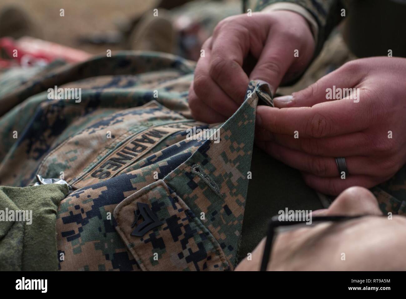 U.S. Navy Hospital Corpsman 3rd Class Joshua Mullin with 8th Engineer ...