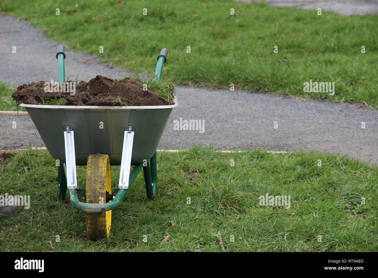 Wheel Barrow Filled with Turf Stock Photo - Alamy