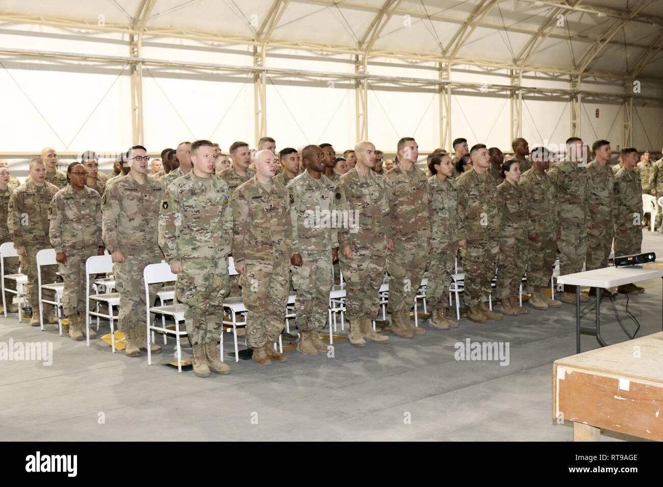 U.S. Army Soldiers graduating from the Basic Leader Course recite the ...