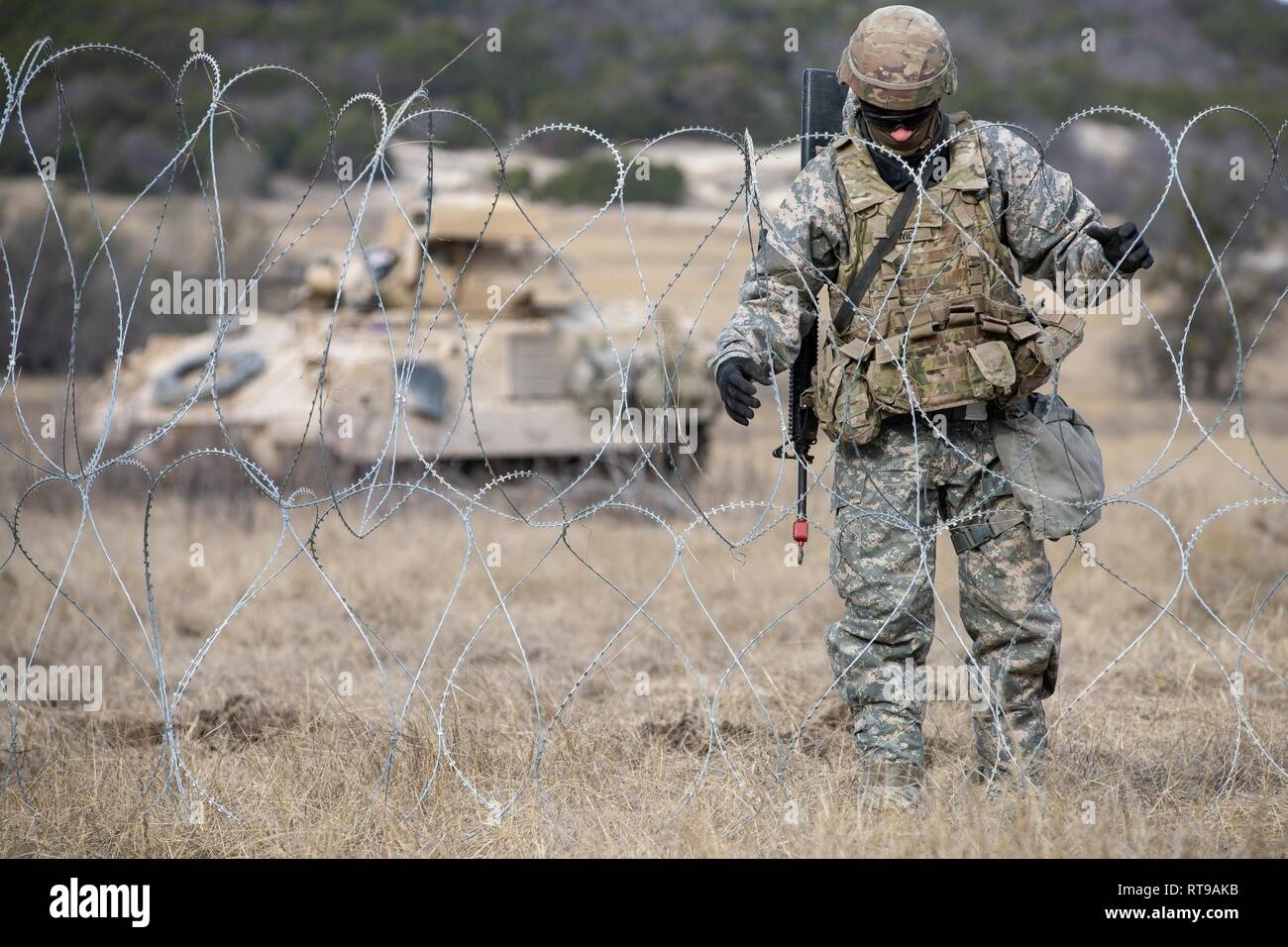 A combat engineer from the 8th Engineer Battalion creates a double ...