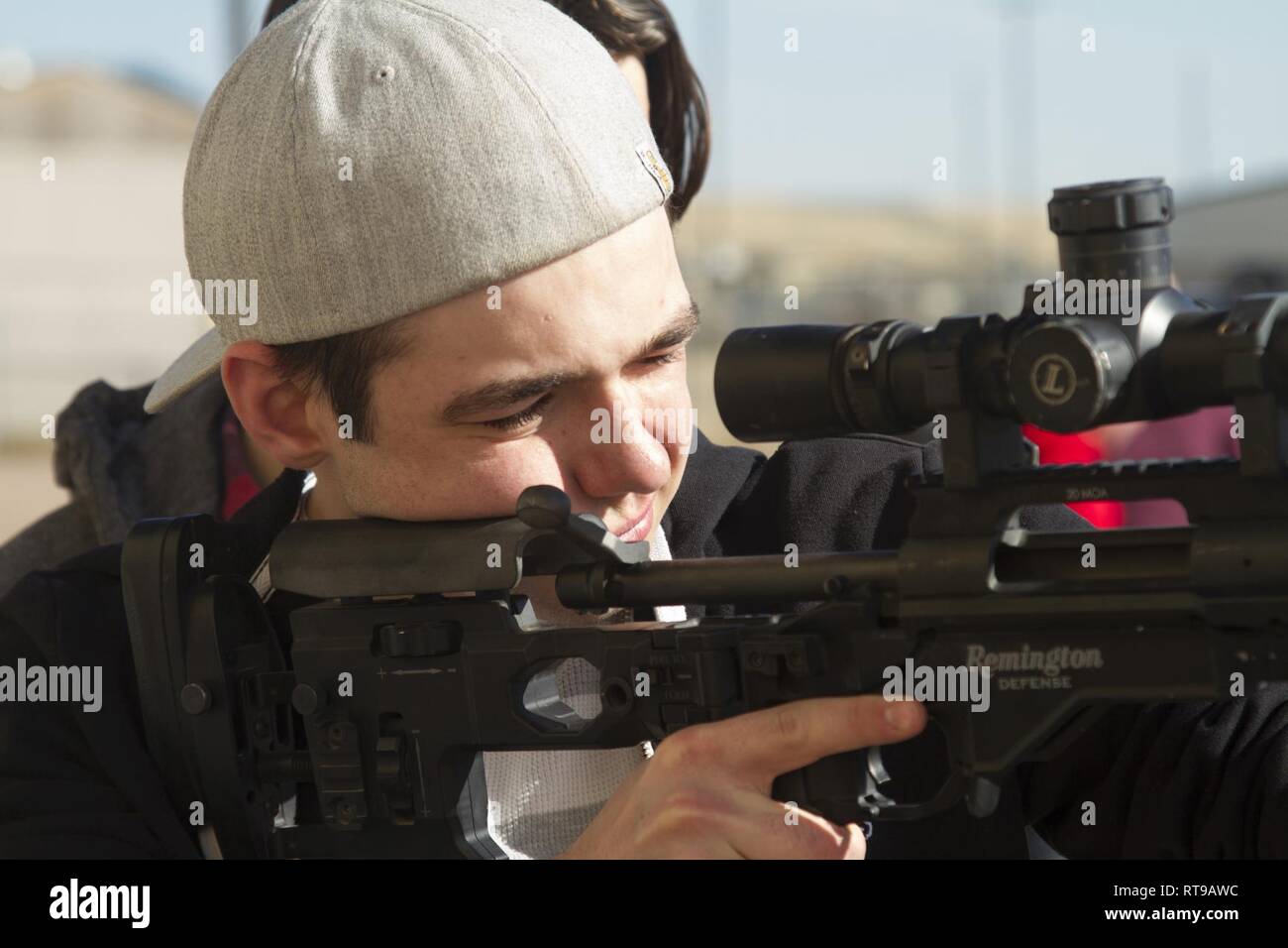 A student from Goal Academy, a free online public high school, takes aim with a sniper rifle ...