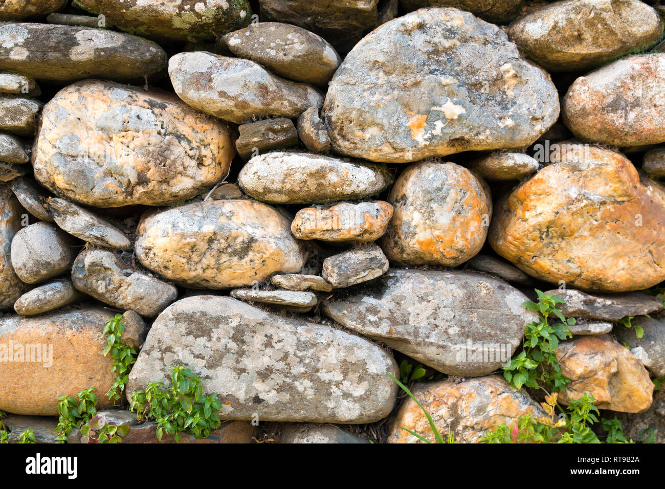 Pattern of a stone wall II Stock Photo - Alamy