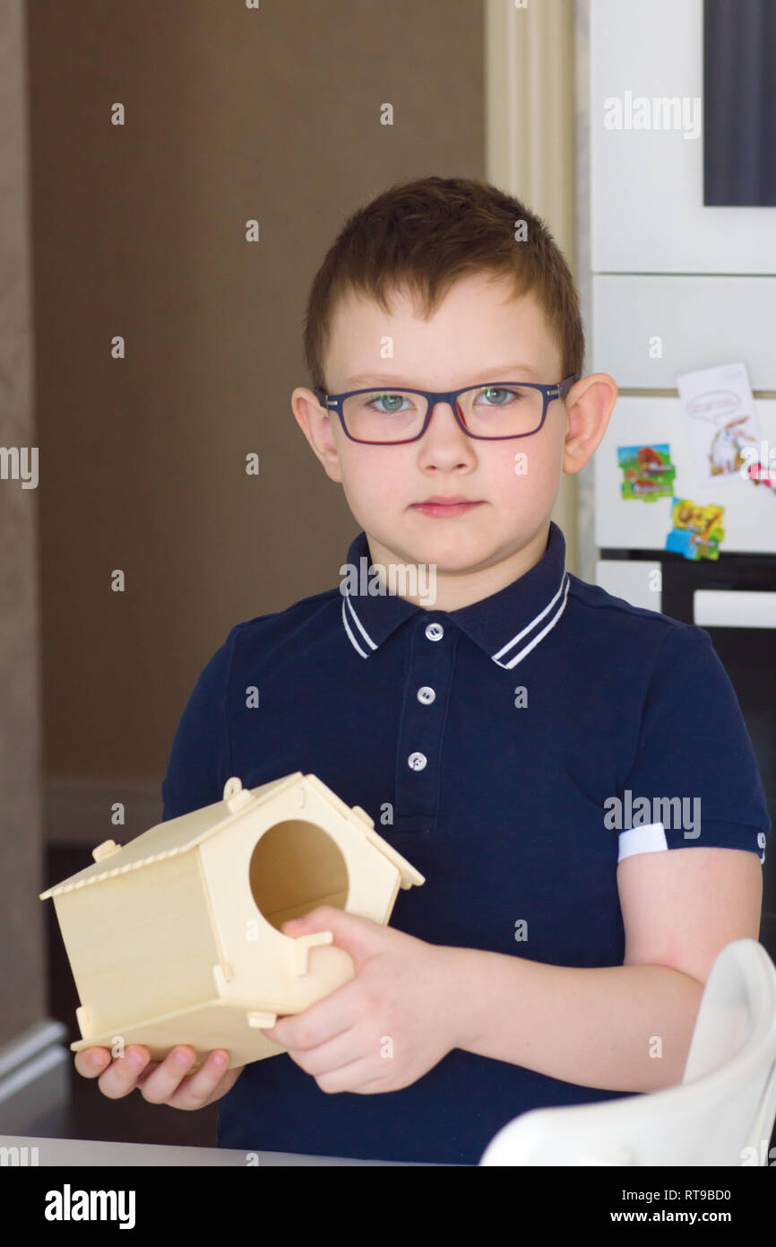 boy made a wooden bird house with his hands Stock Photo - Alamy