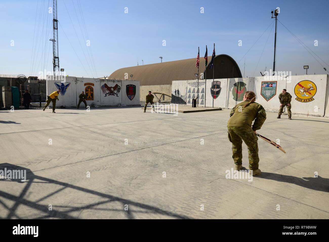 TAAC-Air coalition members play cricket in the courtyard of Forward ...