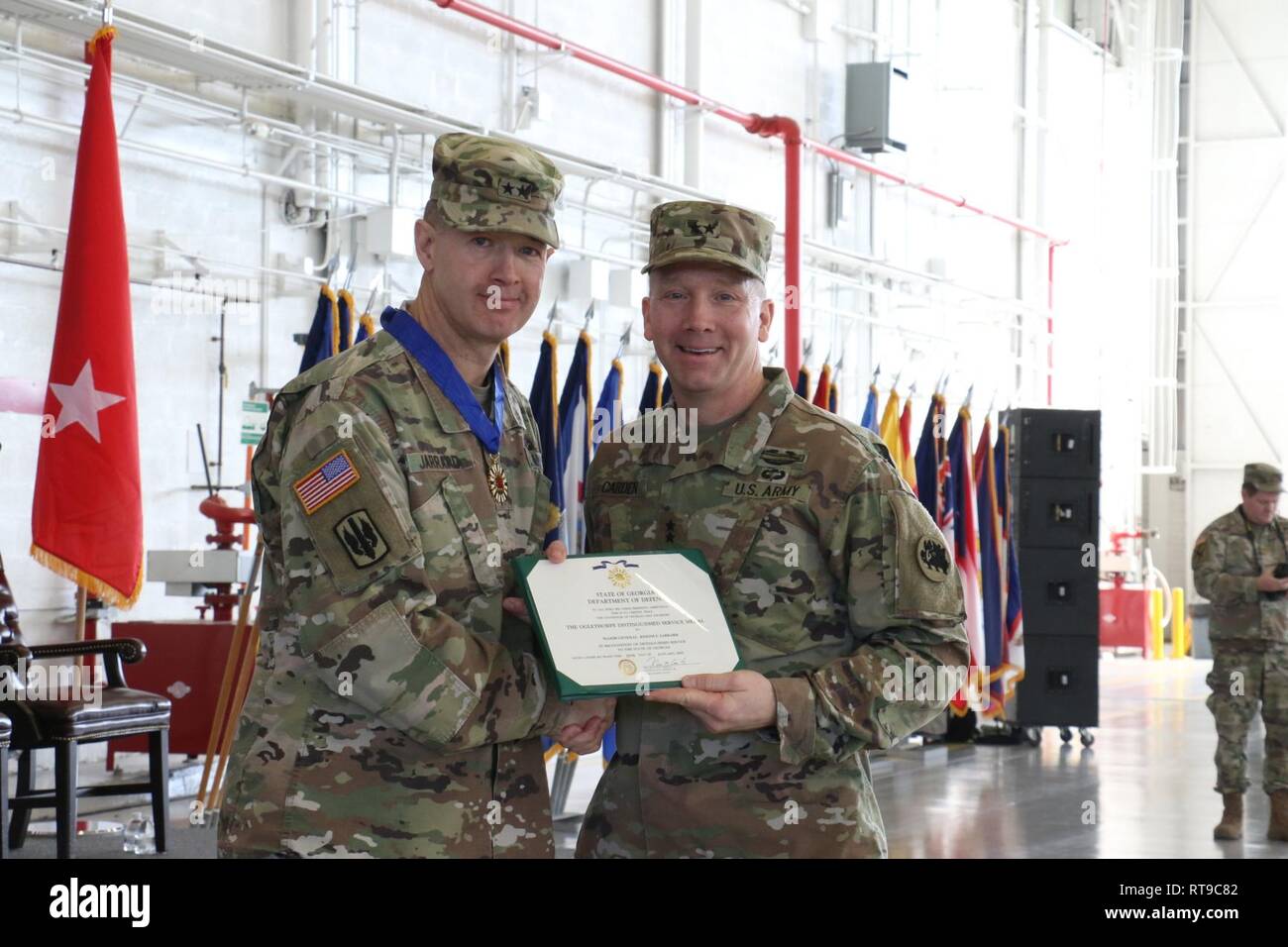 Maj. Gen. Thomas Carden presents Maj. Gen. Joe Jarrard with the ...