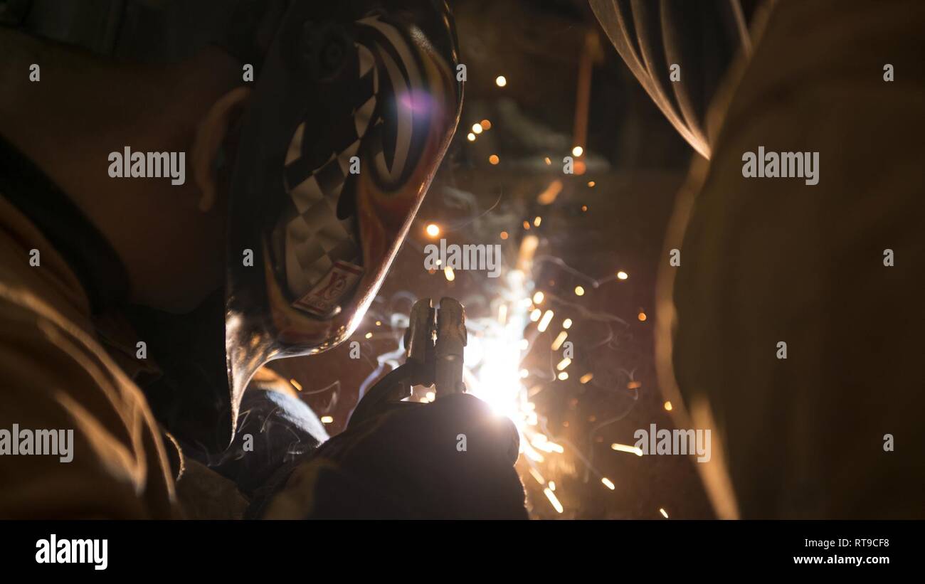 Steelworker 3rd Class Moe Aung, a Reserve Sailor assigned to Amphibious ...
