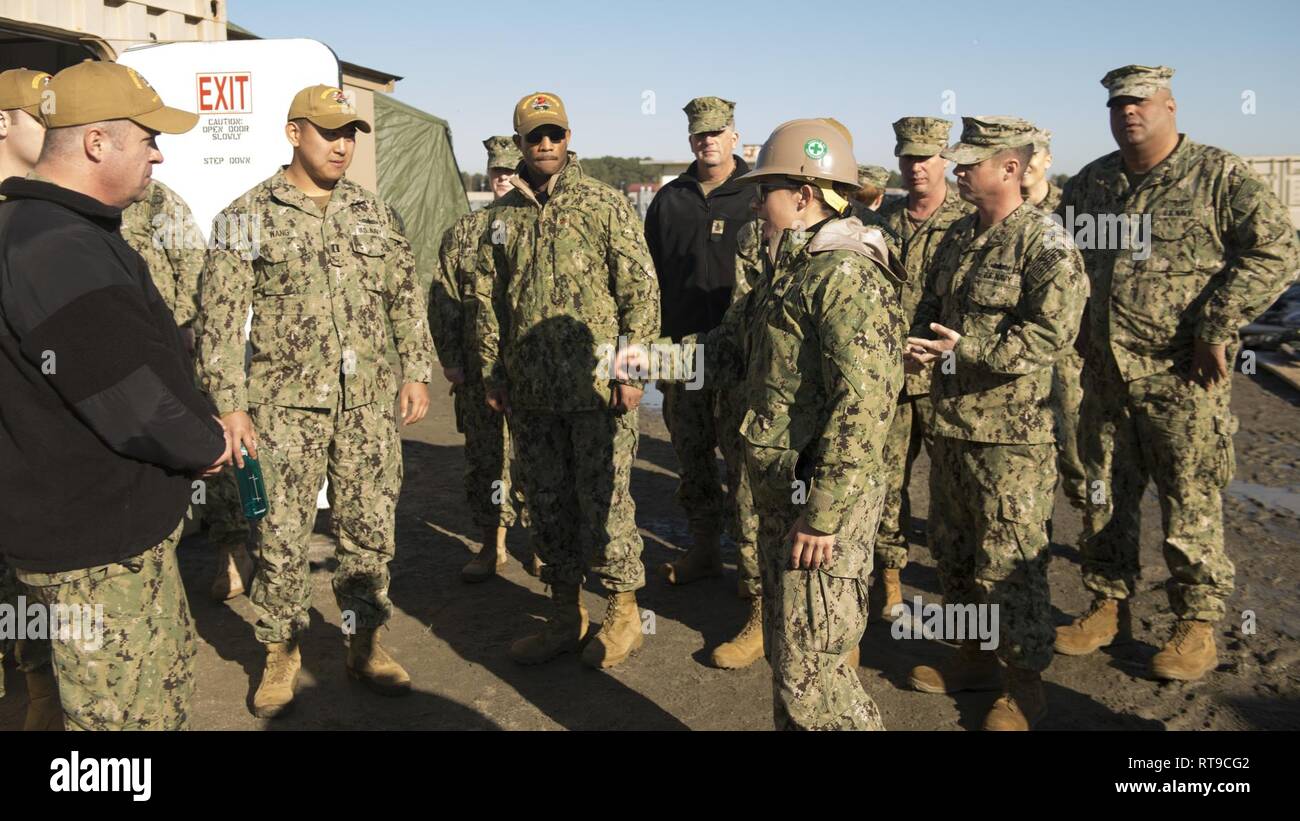 Construction Electrician 2nd Class Ashley Bailey, a Sailor assigned to ...