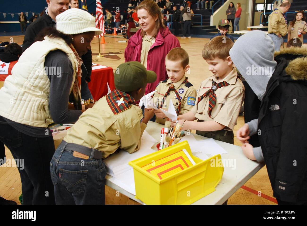 Cub Scouts from U.S. Army Garrison Wiesbaden's Pack 13 work on origami ...