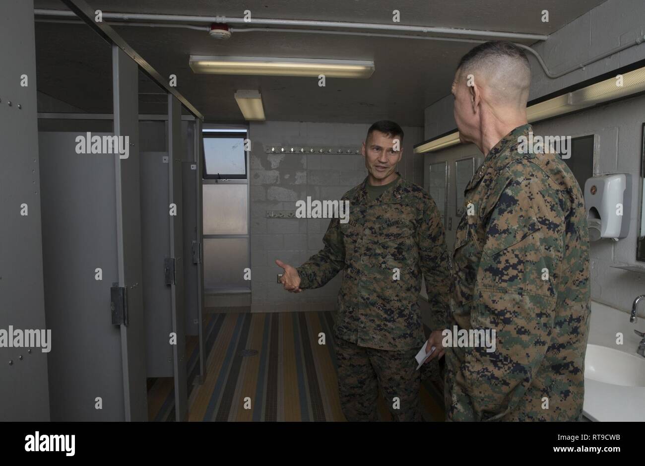 Col. David C. Wallis, left, commanding officer, School of Infantry ...