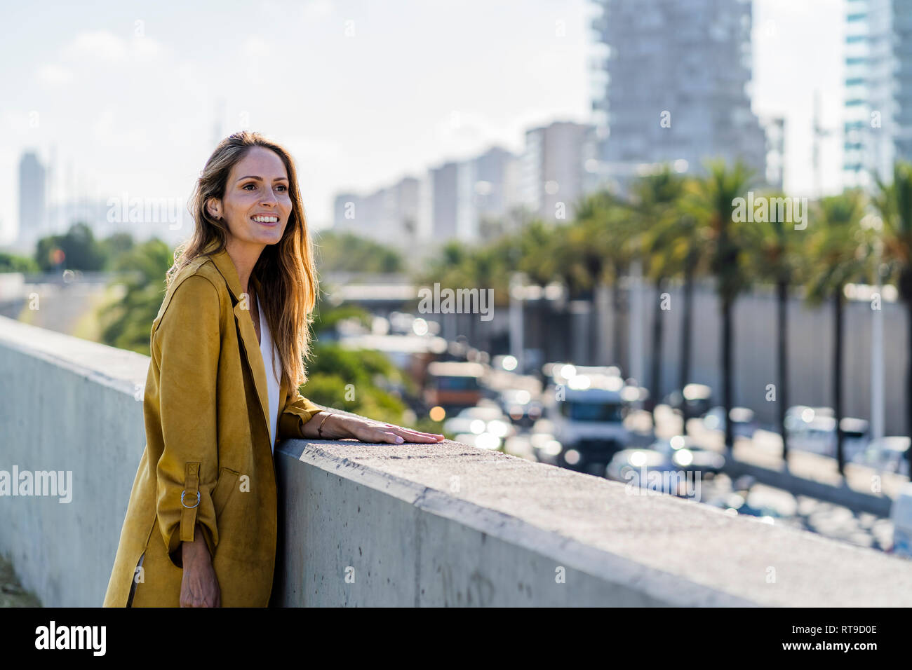 Happy traveler looking city hi-res stock photography and images - Alamy