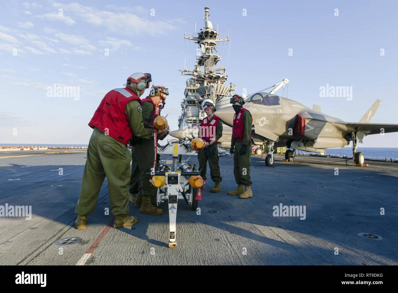 PHILIPPINE SEA (Jan. 28, 2019) - Marines prepare to load Captive Air ...
