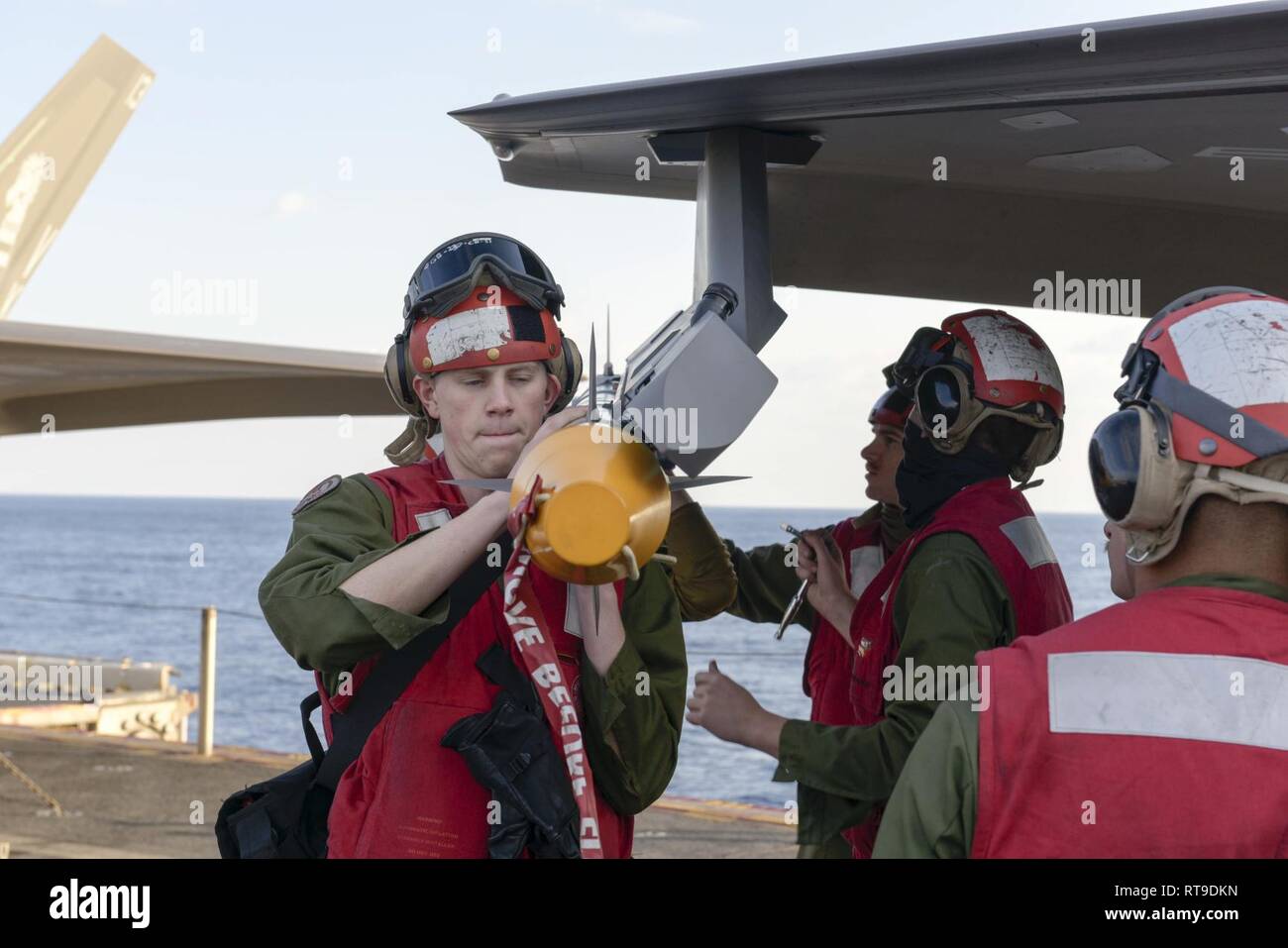 PHILIPPINE SEA (Jan. 28, 2019) - Marines load Captive Air Training ...