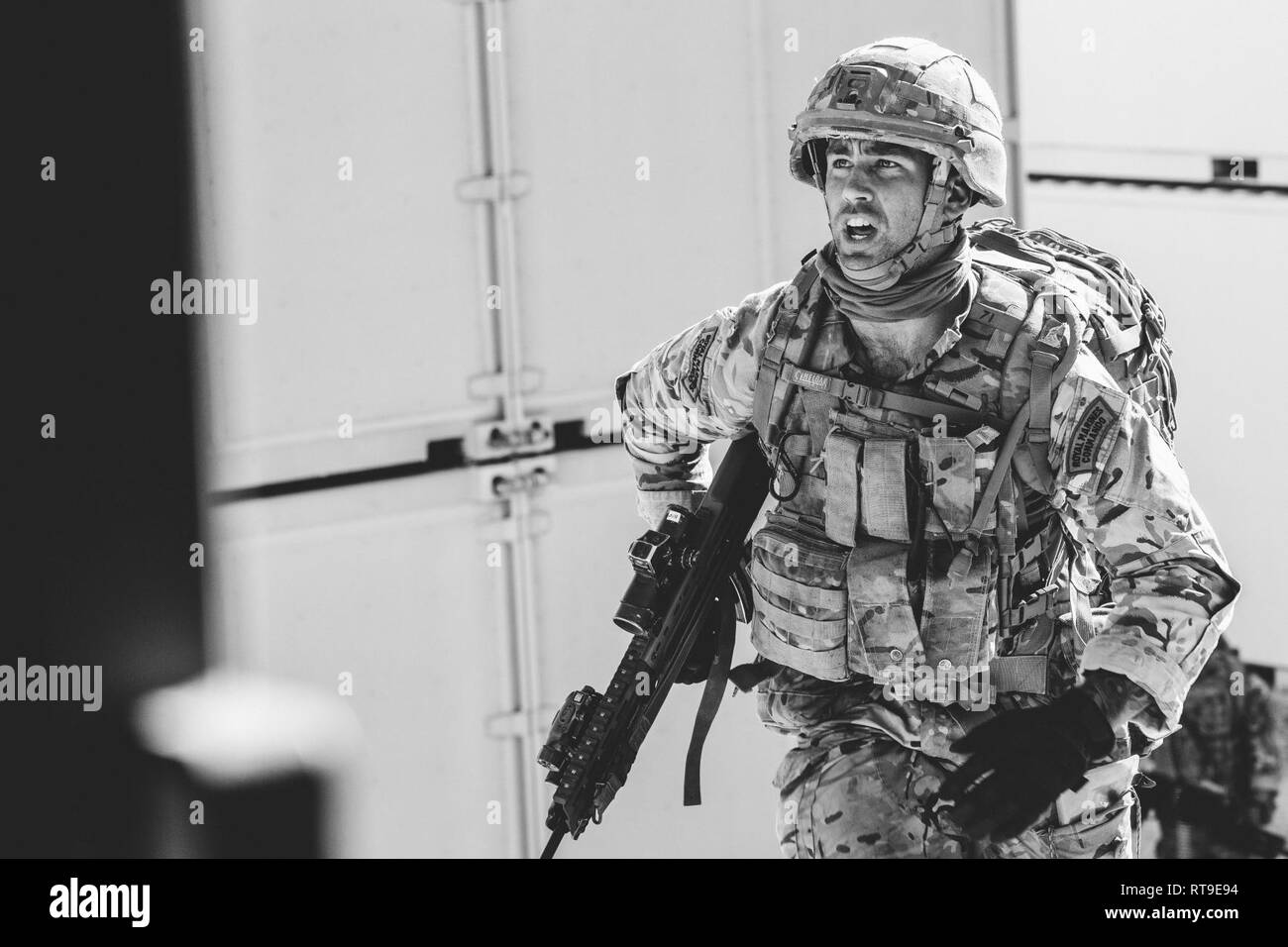 A U.K. Royal Marine with 45 Commando runs in to position during ...