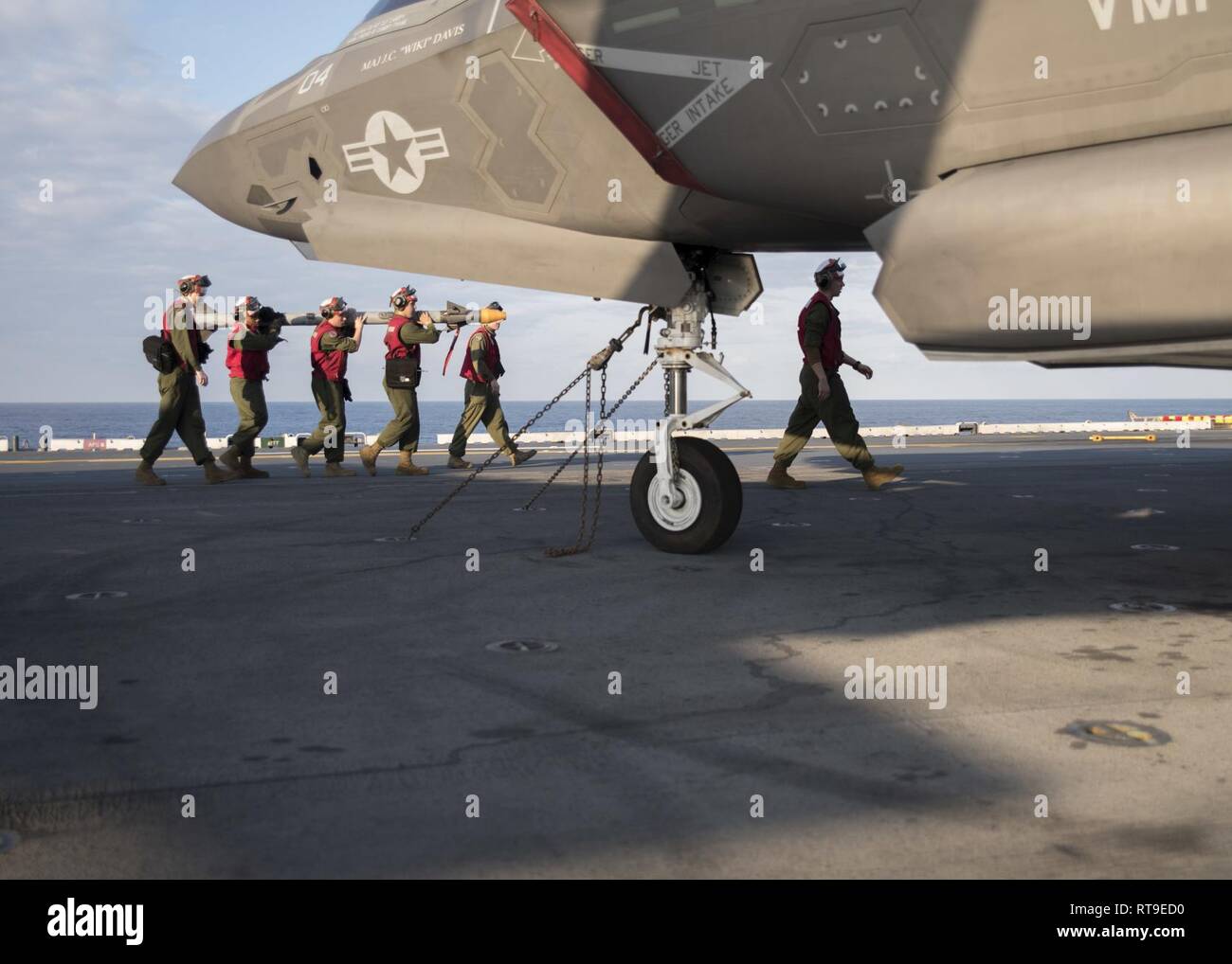 PHILIPPINE SEA (Jan 28, 2019) -- Marines load a Captive Air Training ...