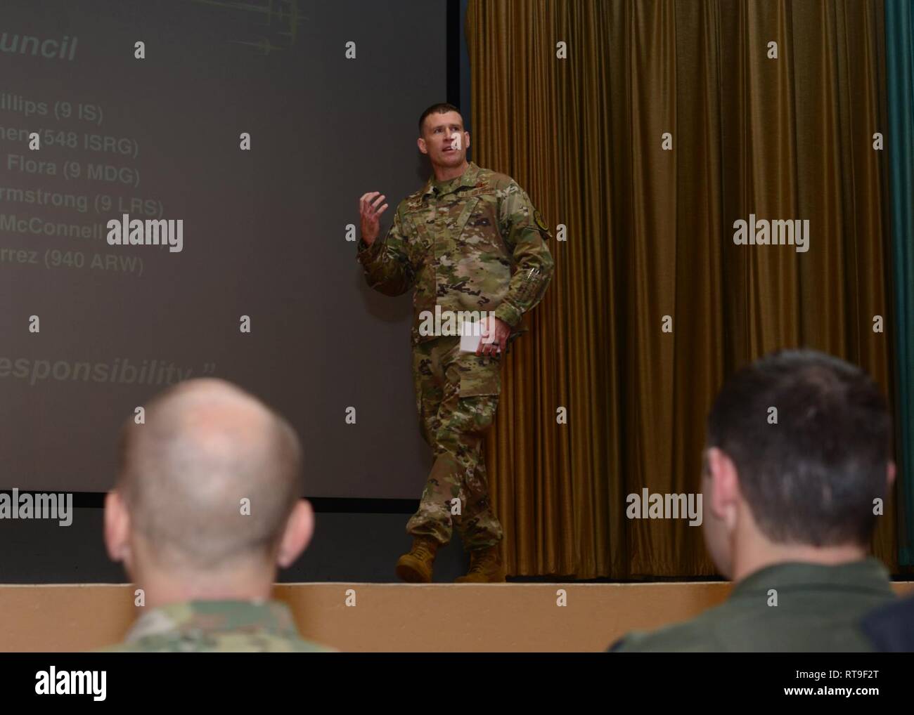 Col. Andrew Clark, 9th Reconnaissance Wing commander, addresses a crowd ...