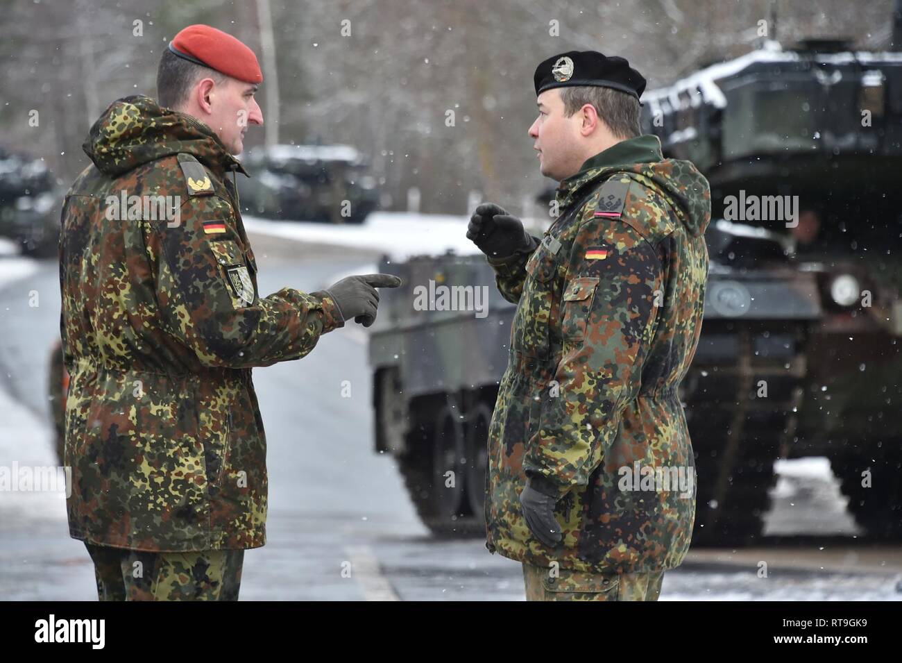 German Brig. Gen. Jörg See, left, commander of the 12th Panzer Brigade ...