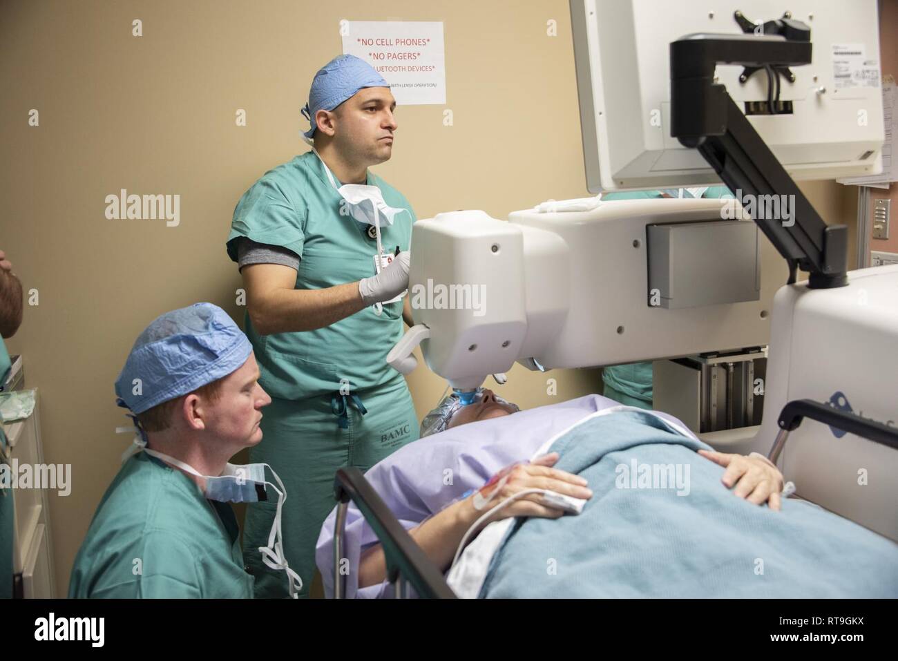 U.S. Army Capt. (Dr.) Nikhil Godbole, staff ophthalmologist, and U.S ...