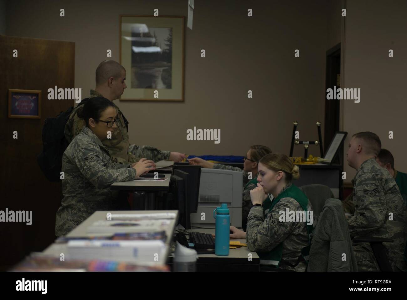 Members of Team Offutt process through the pre-deployment function line ...