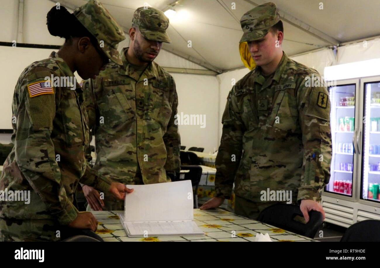 Spc. Arshad Frazier, Pfc. Altiffany Ross, and Pfc. Justin Collee ...