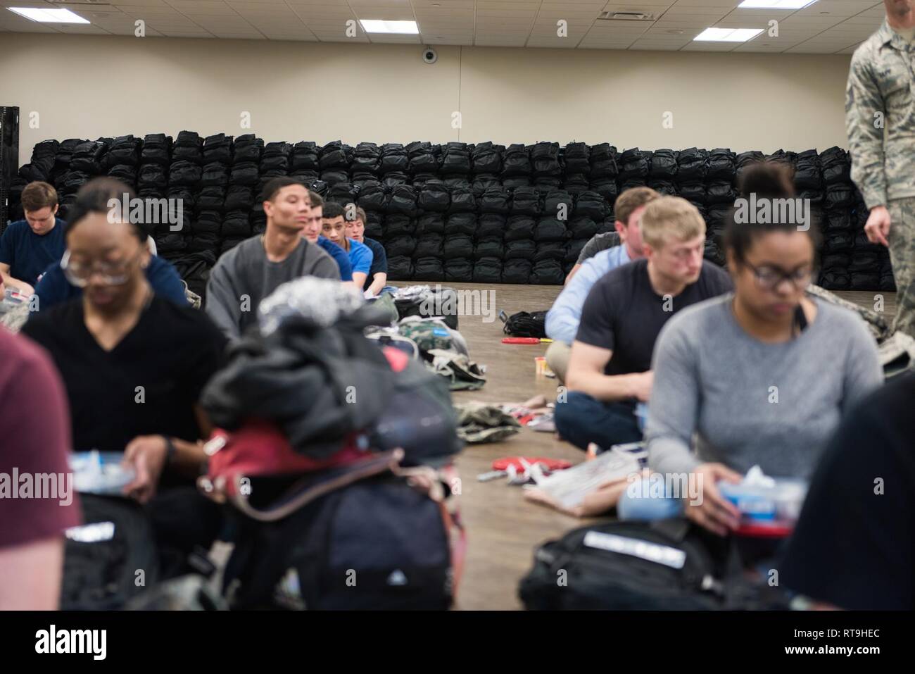 U.S. Air Force basic training trainees inventory items in their issued ...