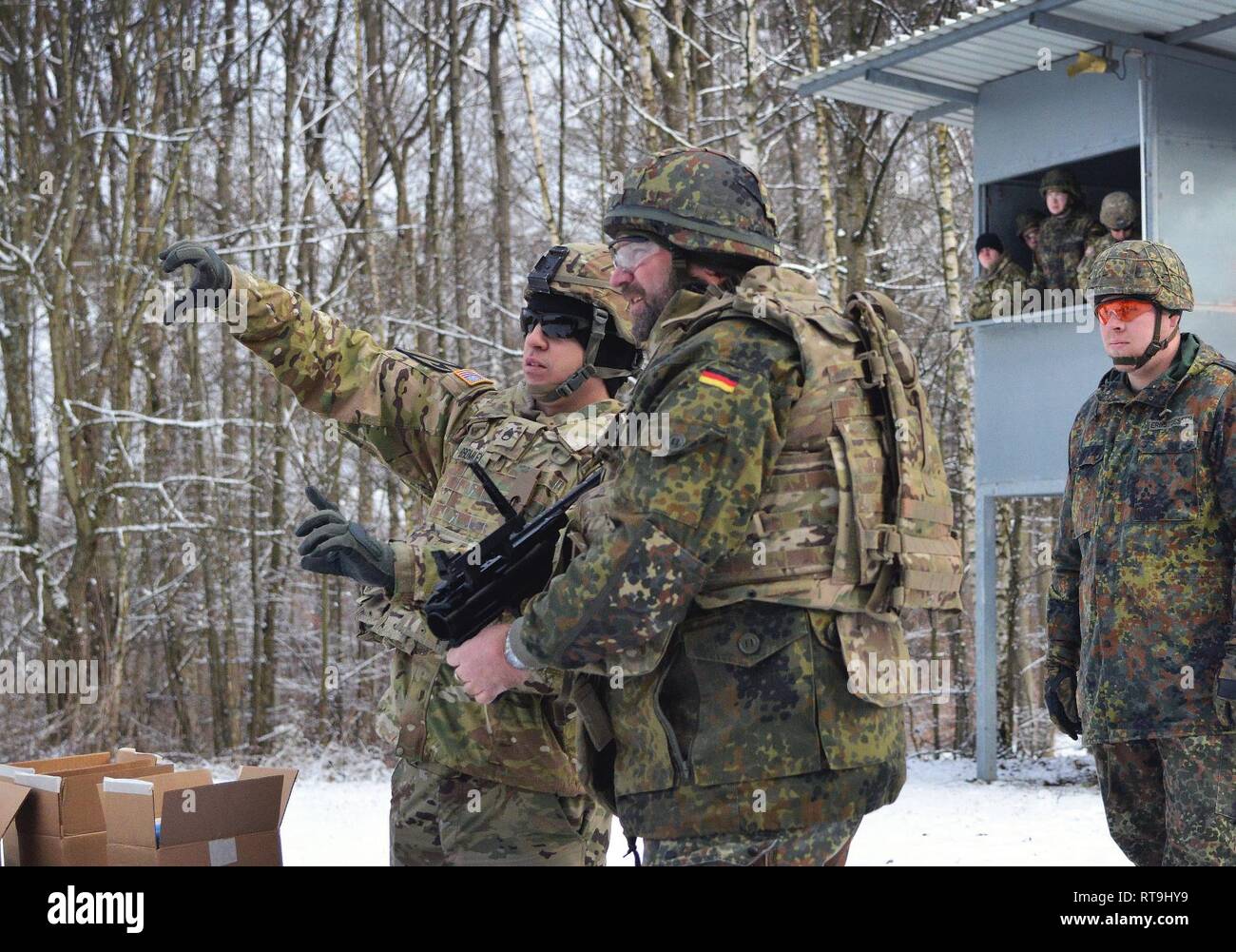 A U.S. Soldier assigned to 554th Military Police Company explains the ...