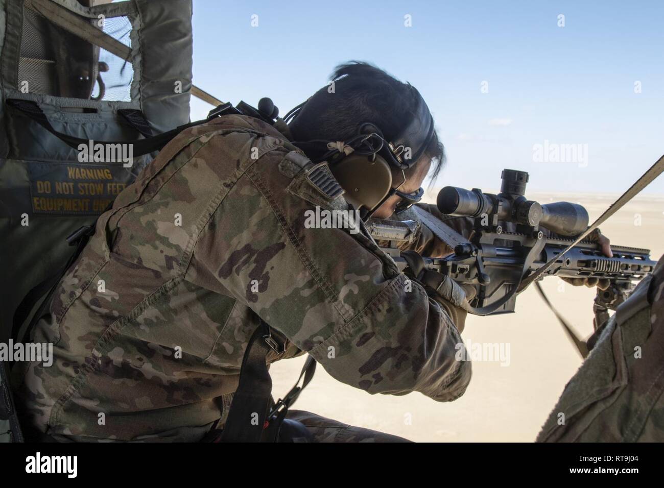 U.S. Army Spc. Marcus Pastron, a sniper for the Kansas National Guard’s ...