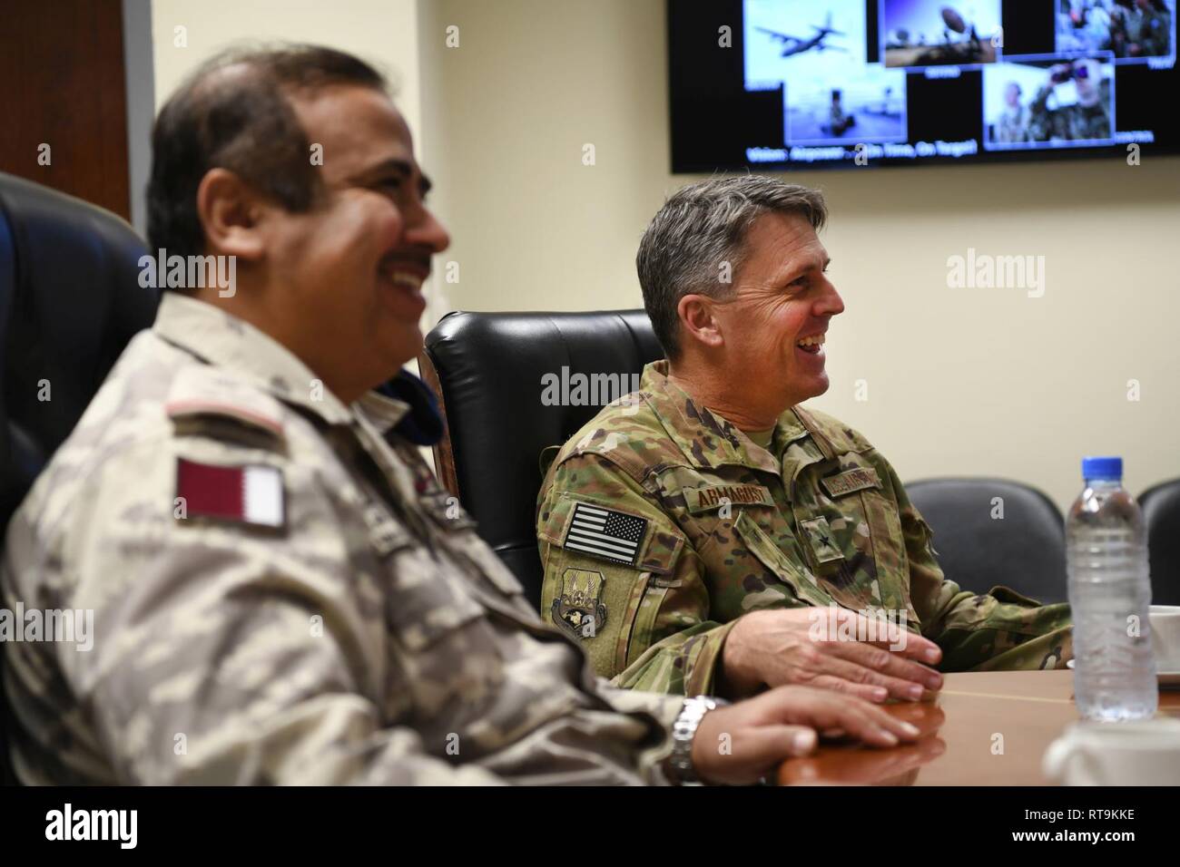 Maj. Gen. (Pilot) Mubarak Mohammed Al-Khiyareen, Qatar Emiri Air Force commander (left), and U.S ...