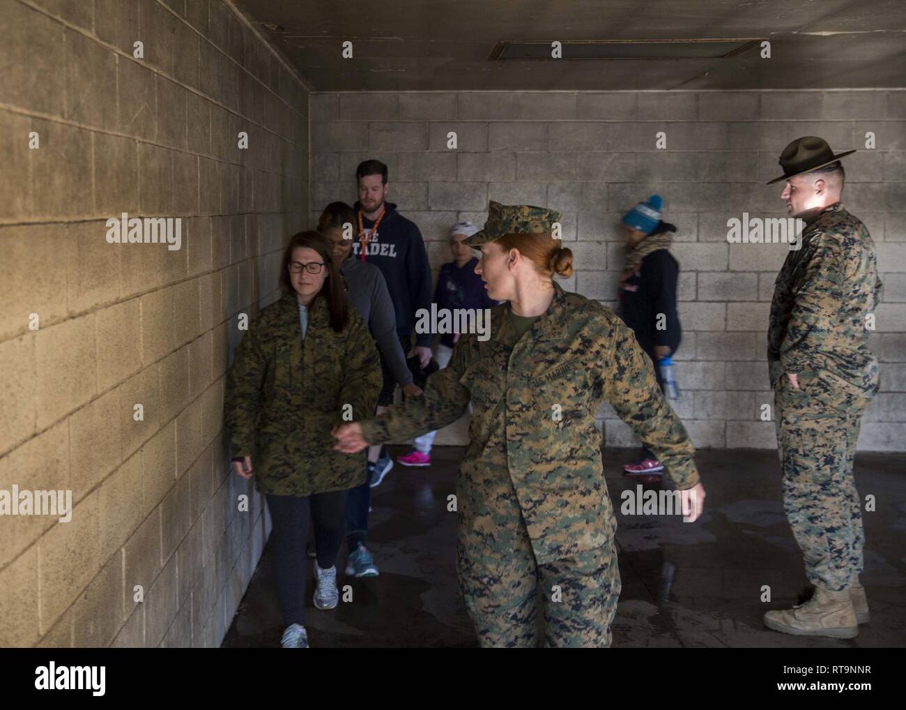 U.S. Marine Corps Capt. Maryanna Sheck, an escorting officer with ...