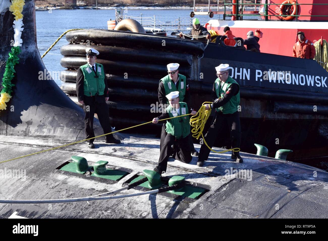 GROTON, Conn. (Jan. 31, 2019) Sailors man the lines as USS North Dakota ...