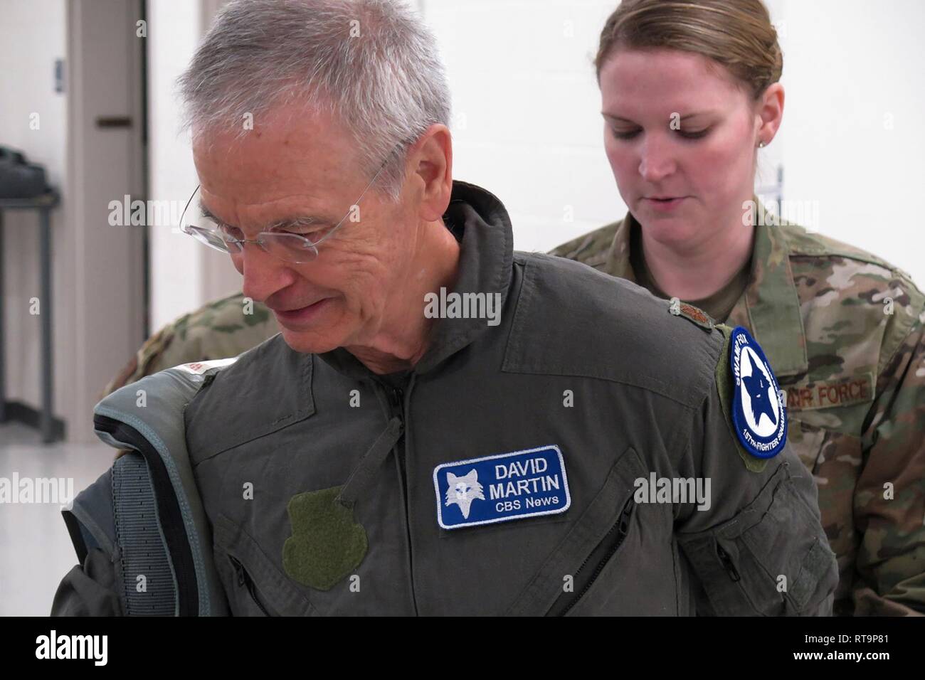 David Martin, CBS News Correspondent, is fitted with a G-suit and ...