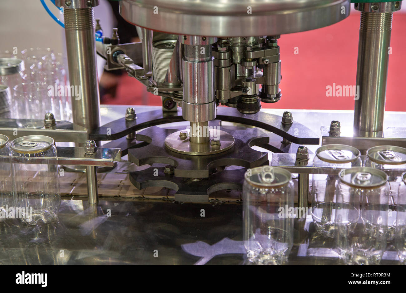 Production line of automatic ring pull can sealing machine Stock Photo ...