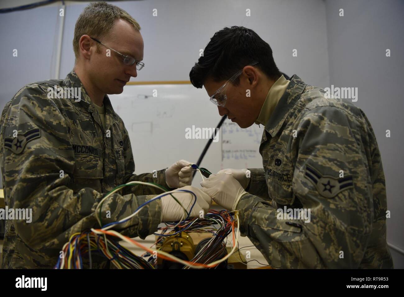 Airman 1st Class John Mcconnico and Airman 1st Class Wilfredo Hernandez Mendez, 90th Missile ...