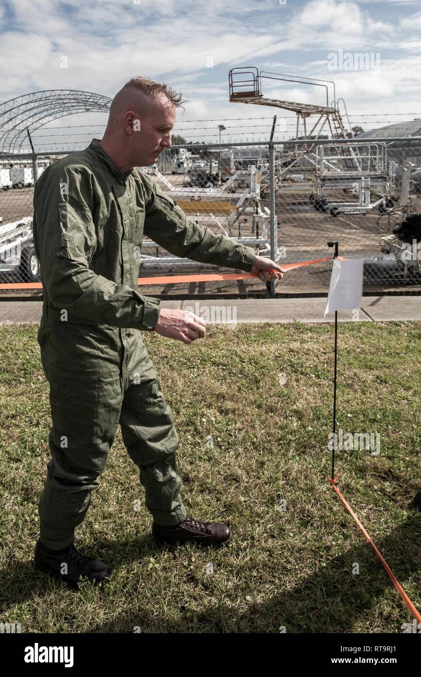 U.S. Marine Corps Lt. Col. Eric Grunke conducts chemical, biological ...