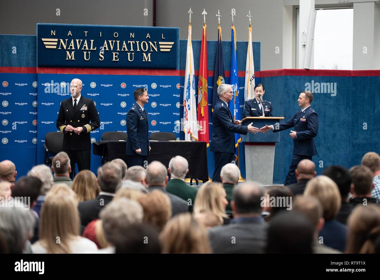 A newly graduated Air Force Combat Systems officer receives their wings ...