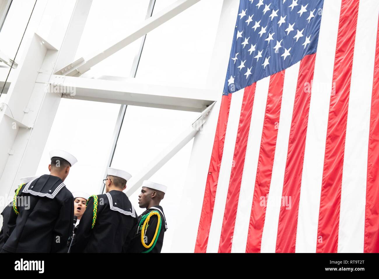 Sailors sing the National Anthem during a Winging Ceremony at the ...