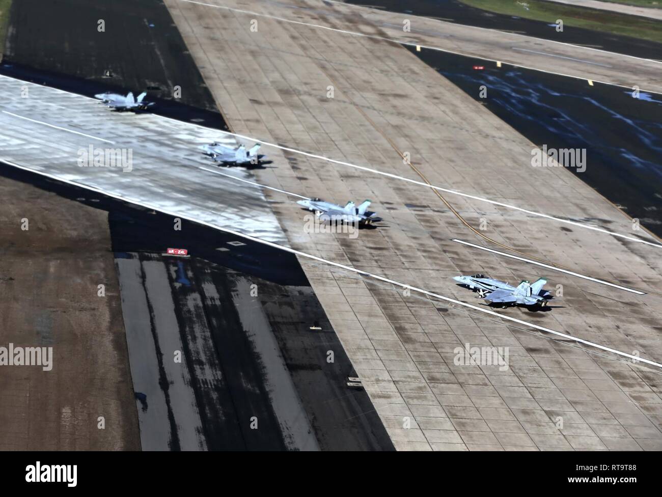 Four F/A-18 Hornets with Marine Fighter Attack Training Squadron (VMFAT ...
