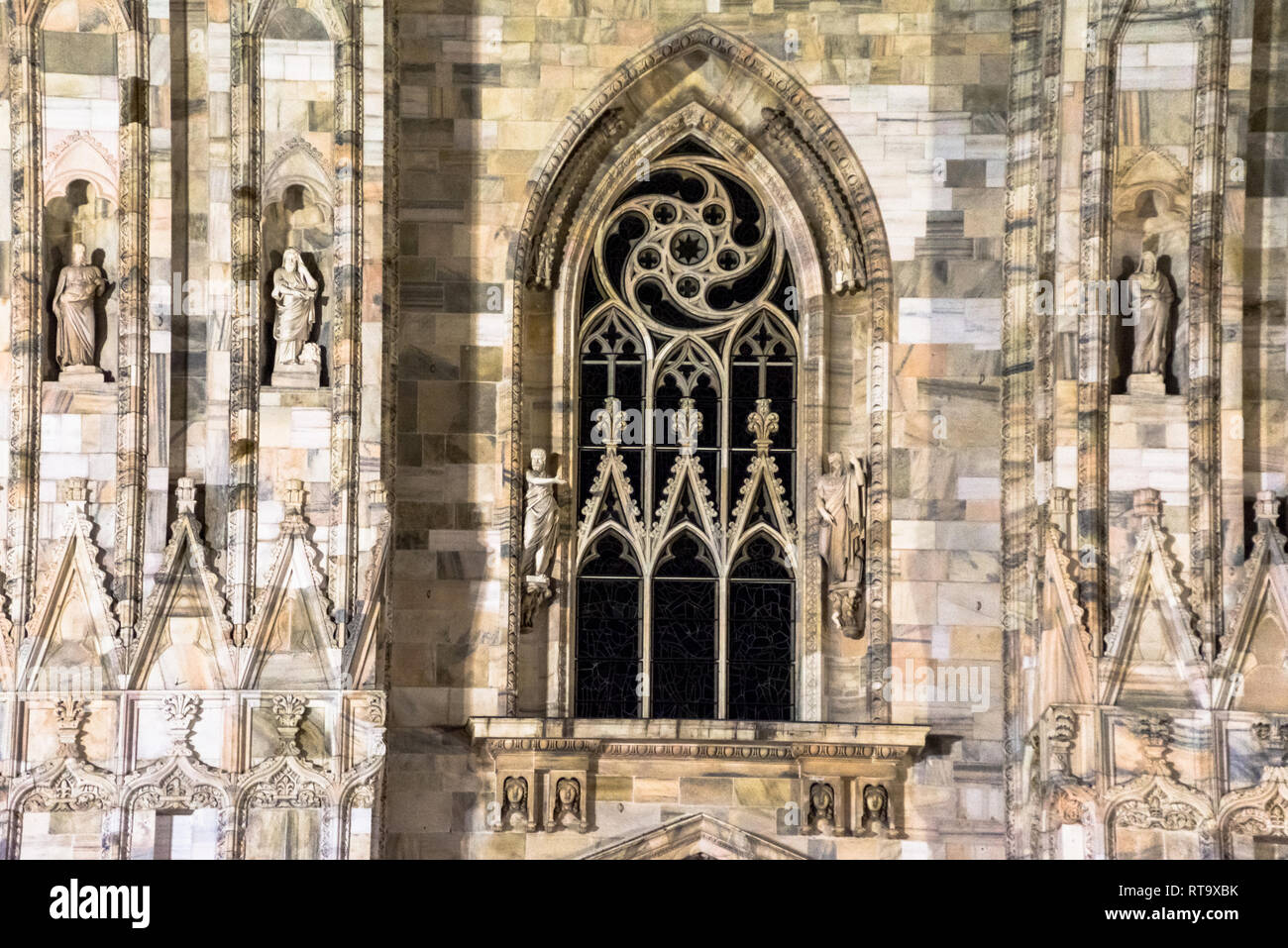 Duomo cathedral window with beautiful stone carving Stock Photo - Alamy