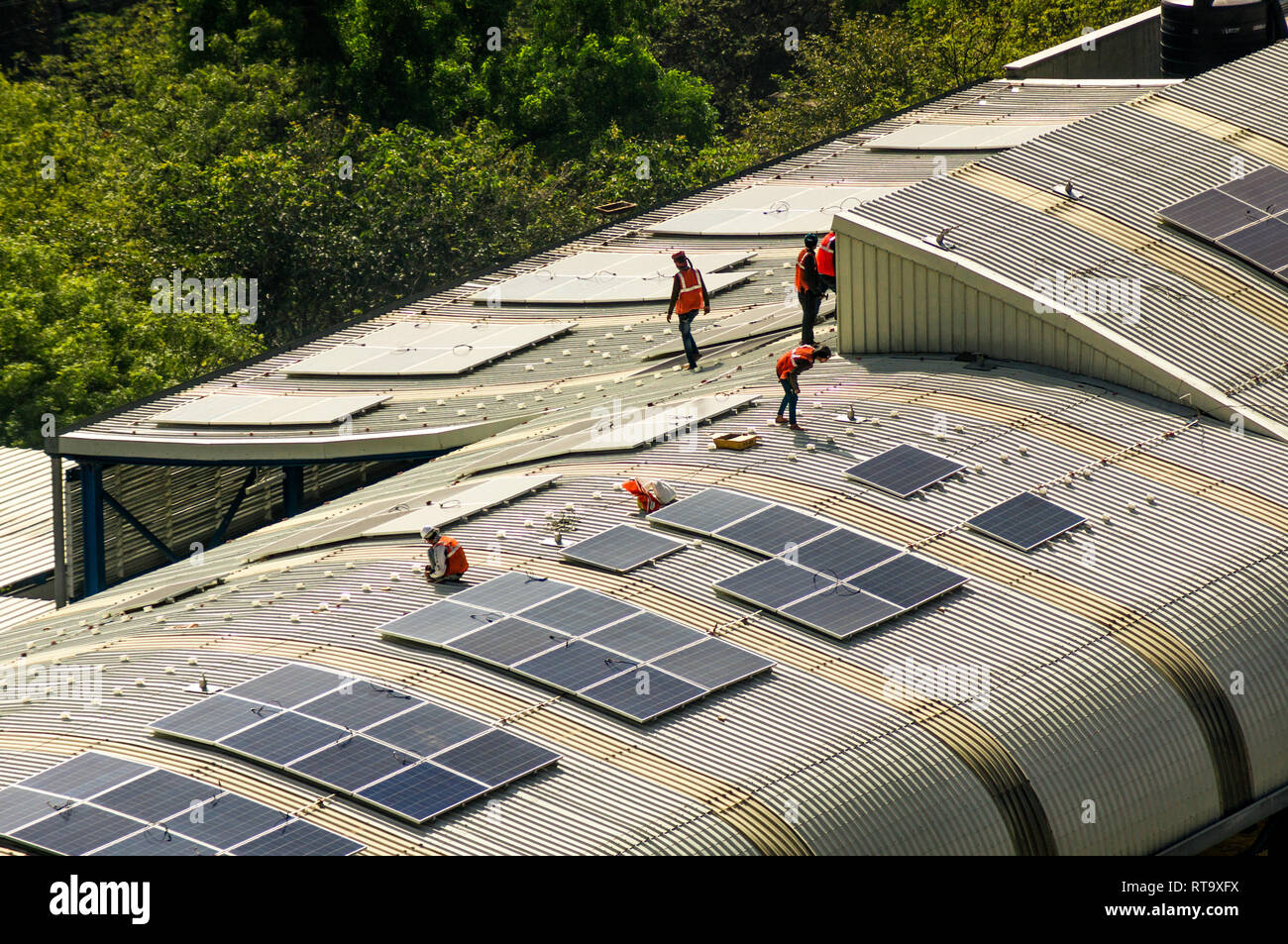 Solar panels being installed on the roof of delhi metro station Stock ...